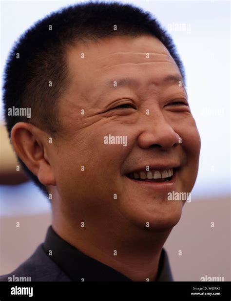 Zhang Yong Founder And Ceo Of Haidilao International Holding Ltd Poses During The Ceremony For