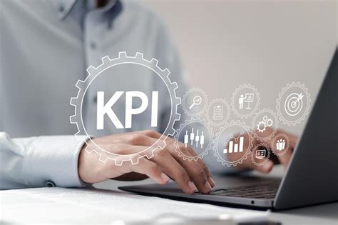 Premium Photo Key Performance Indicator Concept Businessman Using Laptop With Kpi Icons On