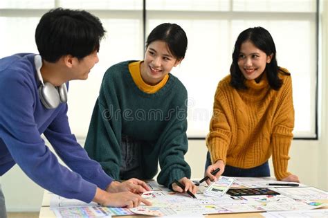 Image Of Mobile Application Designers Team Discussing Brainstorming For New Approaches And