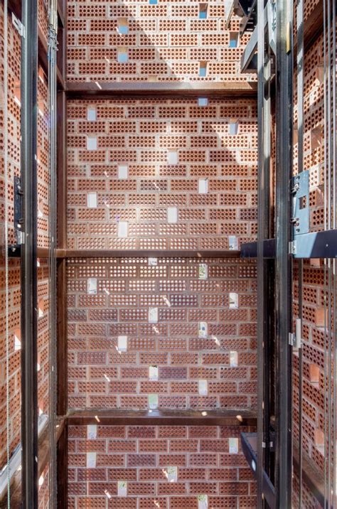 Perforated Brick Elevator Connects Medieval Town To Riverside