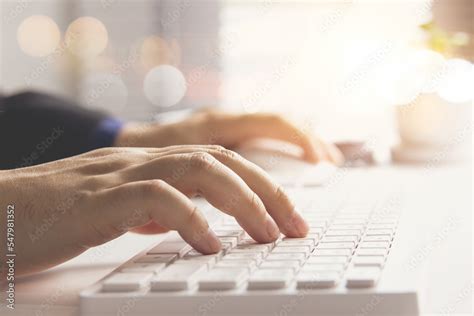 Side View Man Hands Typing Computer Keyboard White Laptop On Desk With
