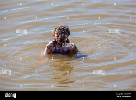 Girl Mud River