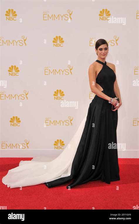 Actress Lizzy Caplan Arrives At The 66th Primetime Emmy Awards Held At