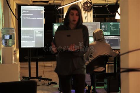 Hackers Team Using Computers To Plant Virus And Hack Network System