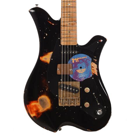 Bacci Leonardo Dual Output Baritone Black Over Sunburst Chicago Music