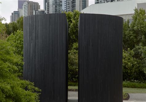 A Monochrome Monolithic Structure Reaching To The Heavens In Two Parts