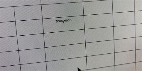 how to vertically center text in a table cell r indesign
