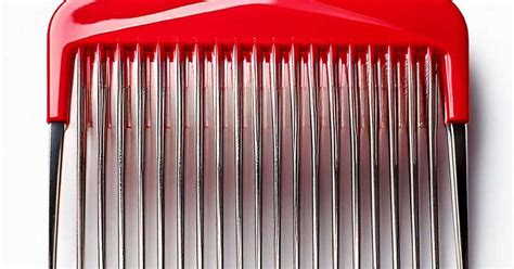 I Found A Tiny Red Object In A Kitchen Drawer That Looks Like A Comb And Has Lengthy Metal
