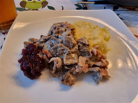 Finnbiff Sliced Reindeer With Mushrooms Bacon And Cream Sauce
