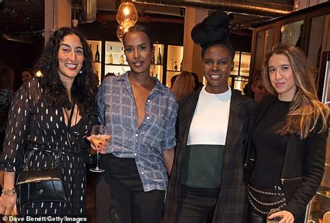 Idris Elba Cuts A Dapper Figure In Dark Grey Suit As He Cosies Up To