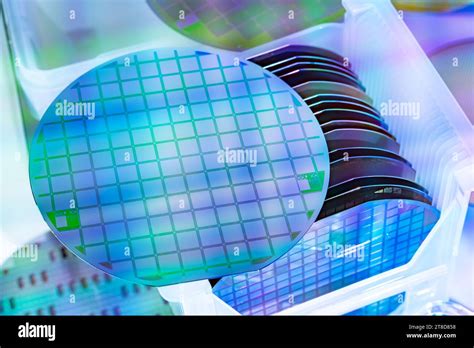 Macro Of Silicon Wafer Semiconductor With Neon Color Integrated Circuits To Manufacture Cpu And