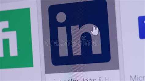 LOS ANGELES USA MAY Installing LinkedIn App On An Electronic Device Screen Close