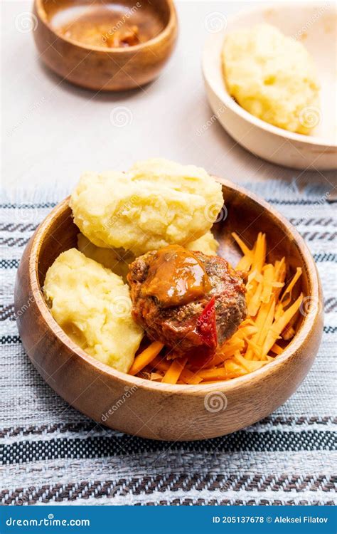African Maize Porridge Called Ugly In Bowl Nshima With Meat And Sweet Potatoes Vertical Photo