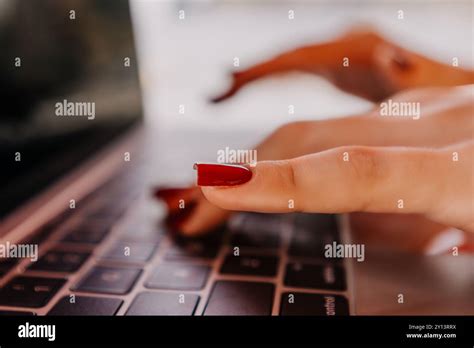 Hands Typing Laptop Keyboard Close Up Woman S Hands With Red Nail Polish Typing On A Laptop