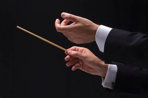 Orchestra Conductor Hands How Does A Conductor Decide What To Do With