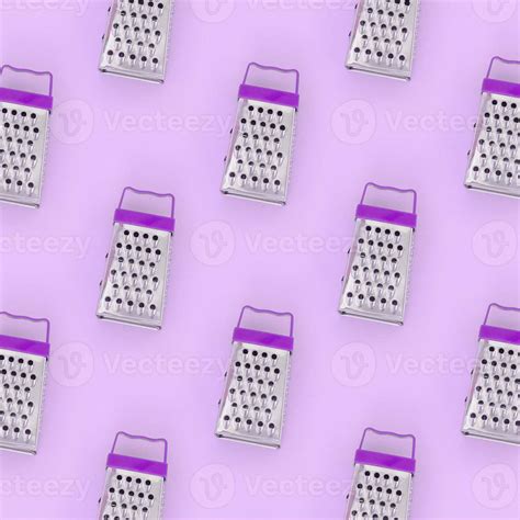 Small Stainless Steel Graters Lies On A Pastel Colored Paper Kitchen Accessories Tools For