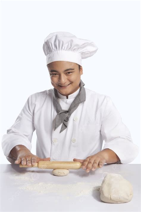 Portrait Of Chef Rolling Dough Photo Background And Picture For Free