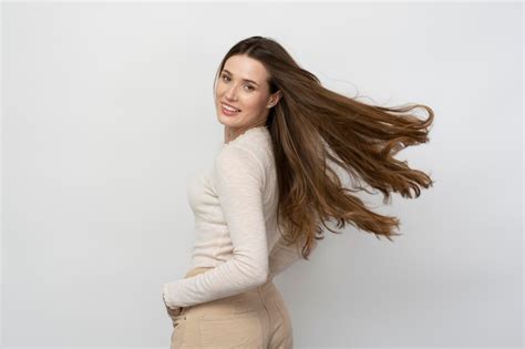 Premium Photo Happy Brunette Woman With Healthy Long Hair Posing For