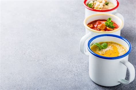 Premium Photo Homemade Assorted Soups With Ingredients