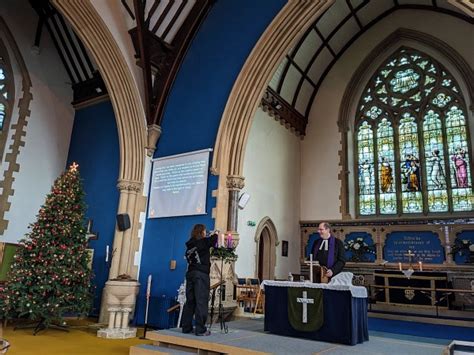 Lighting 3rd Advent Candle Trinity Church Abingdon
