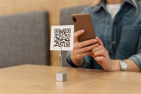 Premium Photo Person Scanning Qr Code