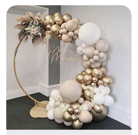 Elegant Gold And White Balloon Arch