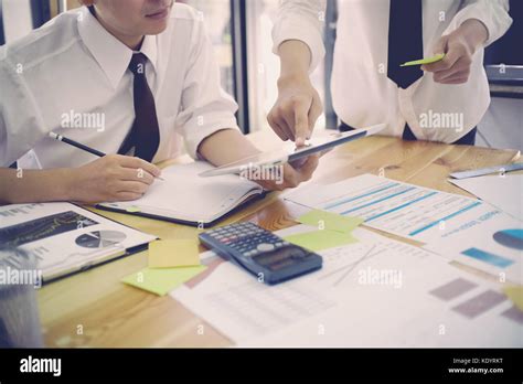 analysis business concept analysis business concept two businessman working on tablet computer