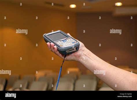 Woman Holding Portable Barcode Scanner Reader Device With Pencil Stock Photo Alamy