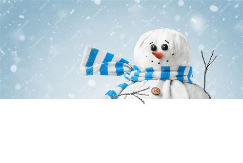 Premium Photo Cute Snowman Waving His Hand On A Blue Background With White Isolated Copy Space