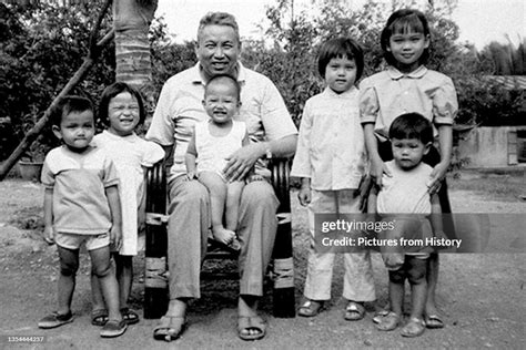 Khmer Rouge Leader Saloth Sar Aka Pol Pot Sitting With Group Of