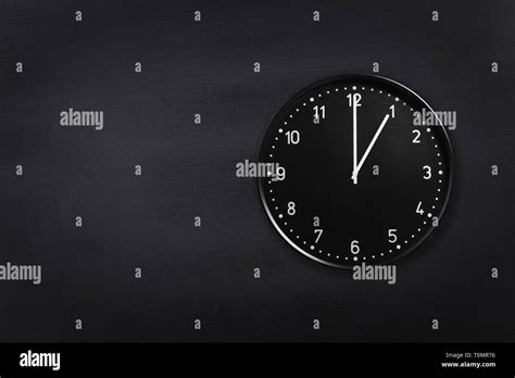 Wall Clock Showing One Oclock On Black Chalkboard Background Office Clock Showing 1am Or 1pm