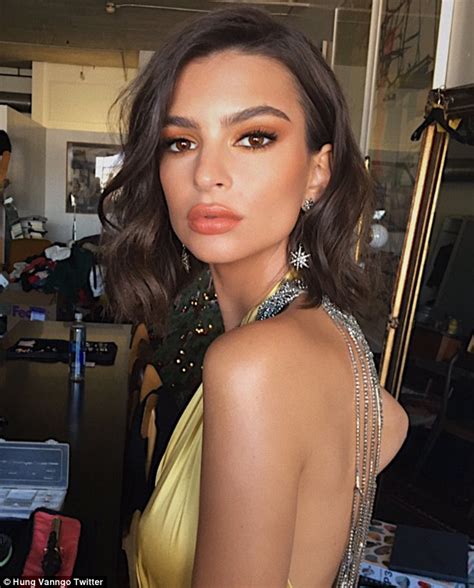 Emily Ratajkowski Flashes Her Panties As She Swings Open Her Split