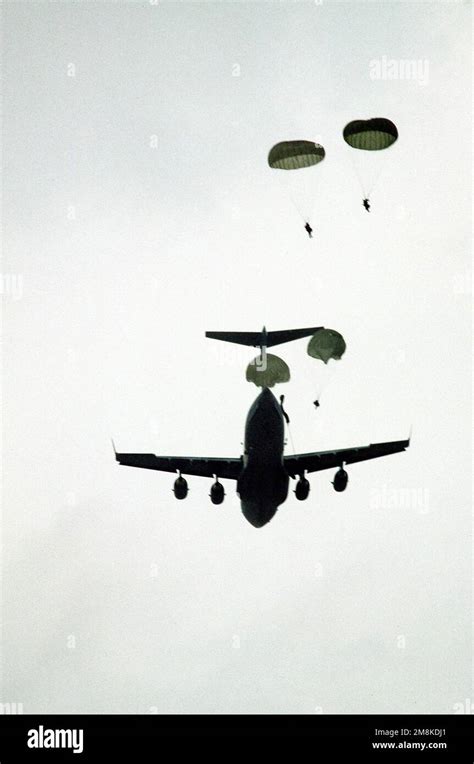 Us Army Paratroopers From The 82nd Airborne Division Parachute From A