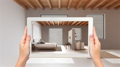 증강 현실 개념입니다 Ar 응용 프로그램이 있는 핸드 홀딩 태블릿은 빈 목조 인테리어 Japandi 최소한의 침실과 욕실에서 가구를 시뮬레이션하고 제품을 디자인하는 데