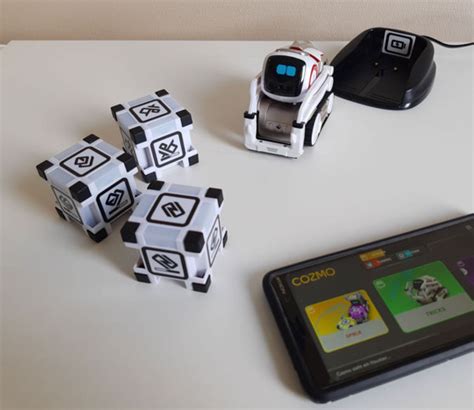 1 Cozmo Robot With Toy Cubes And Its Smartphone App Download Scientific Diagram