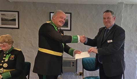 The Deputy Bailiff Presented A Cheque To The Regional Manager Of The Leprosy Mission At Cumbria