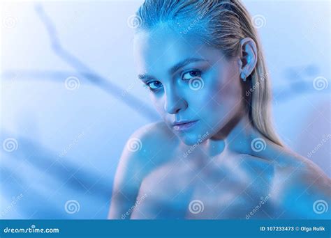 Beautiful Blond Model With Nude Make Up Slicked Back Hair And Naked