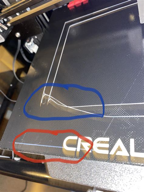 Is My Bed Not Level Right Or Is The Filament Not Adhering The Blue One Is Too High Up So Its