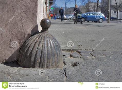 The Angular Cast Iron Pedestal In Form Of Man For Limiting Of Swing Gates In District Praga