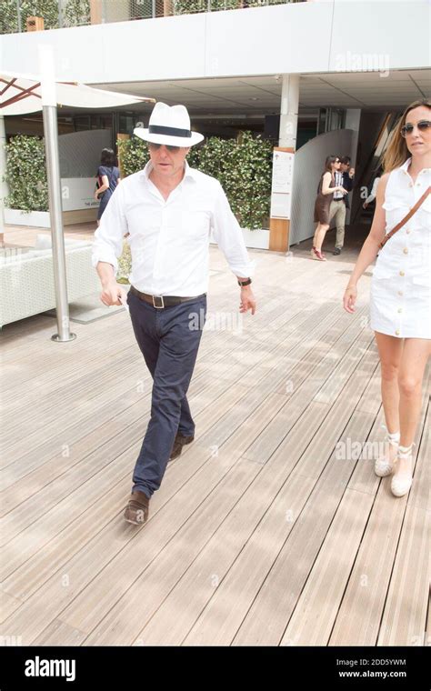 Hugh Grant And Anna Elisabeth Eberstein In Village During French Tennis