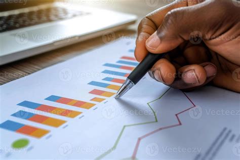 Ai Generated Close Up Hand Businessman Review Report Graphs And Charts