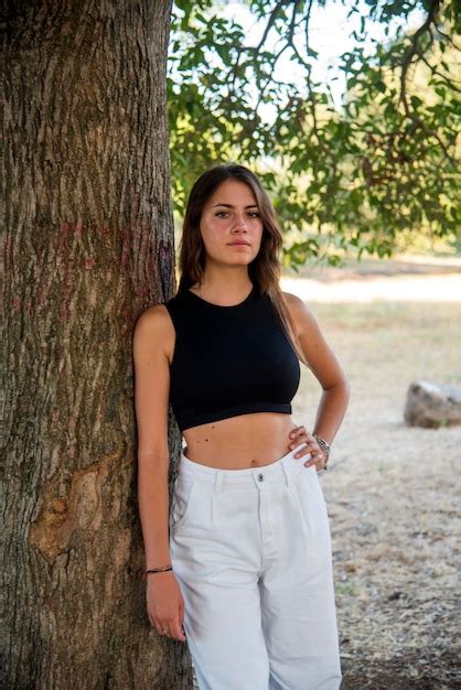 Premium Photo Beautiful Italian Girl At The Park Wearing A Dress