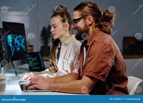 Side View Of Young Male It Engineer Typing On Laptop Keyboard Stock Image Image Of Device