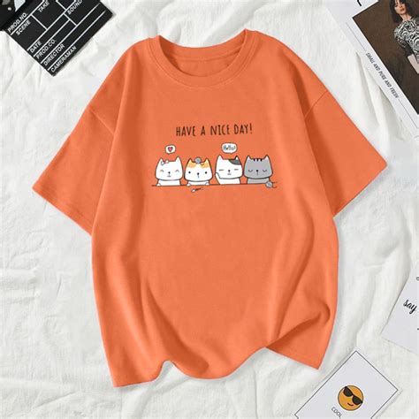 เสื้อยืดผู้หญิงแฟชั่นสาวลายการ์ตูนน่ารักโอเวอร์ไซส์เสื้อผ้าแฟชั่นส่วนยาวหลวมของเวอร์ชั่นเกาหลี