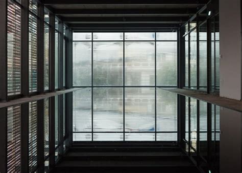 Red Mirrored Lattice Encloses Office Block By Wise Architecture