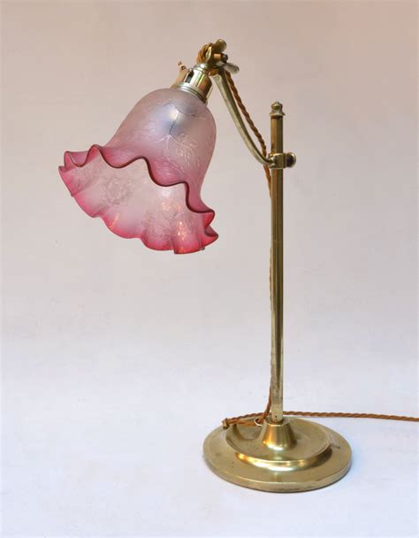 Adjustable Brass Table Lamp With Pink Through Clear Etched Glass Shade