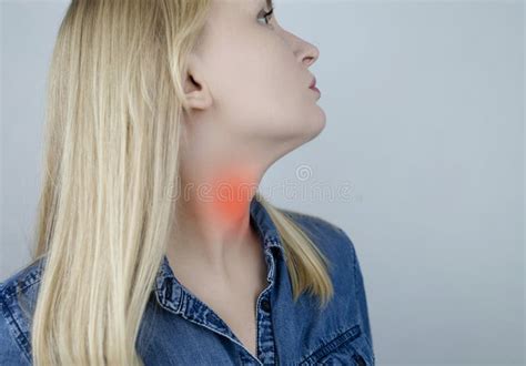 Thyroid Disease Woman Points To Her Neck Where The Thyroid Gland Is