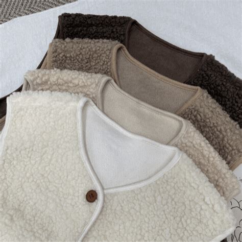 뽀글이 양털 무스탕 주머니 조끼