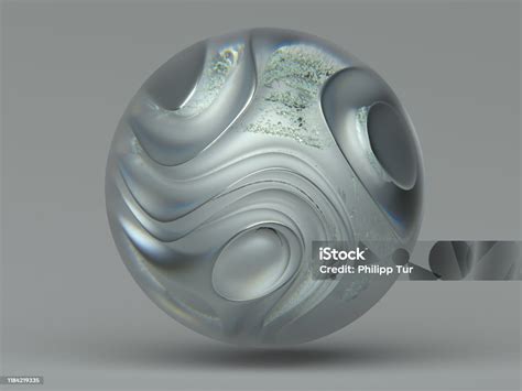 회색 배경에 무광택 알루미늄 금속 소재의 유기 곡선 둥근 물결 모양의 부드럽고 부드러운 바이오 형태로 내부에 물체가있는 추상적 인 3d 유리 공의 3d 렌더링 유리 재료에