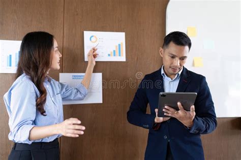 Strategic Planning Business Team Discussing Data Insights On A